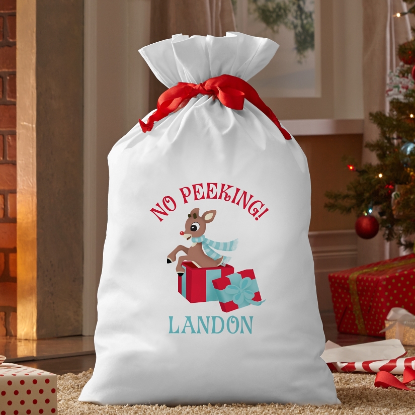 Rudolph® No Peeking Oversized Gift Bag at Gifts.com