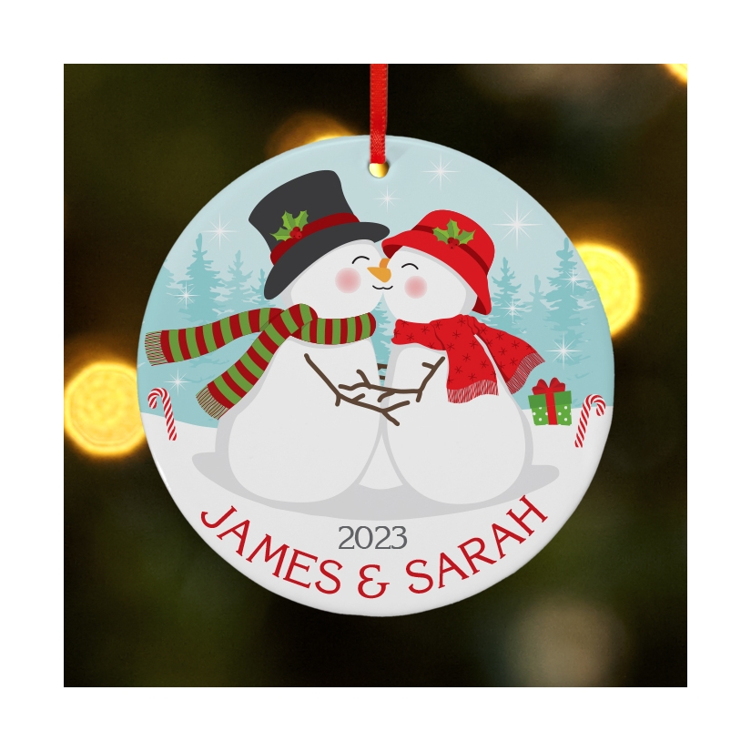Smooching Snowmen Round Ornament at Gifts.com