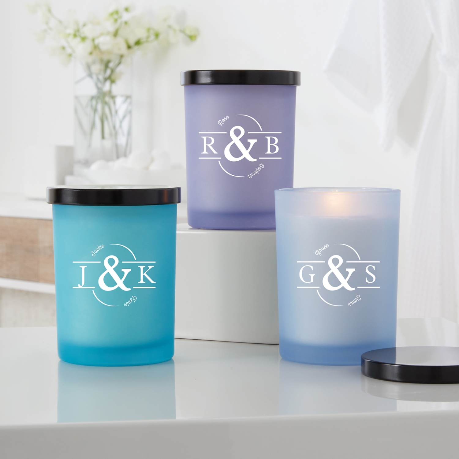 Our Name and Initial Glass Candle at Gifts.com